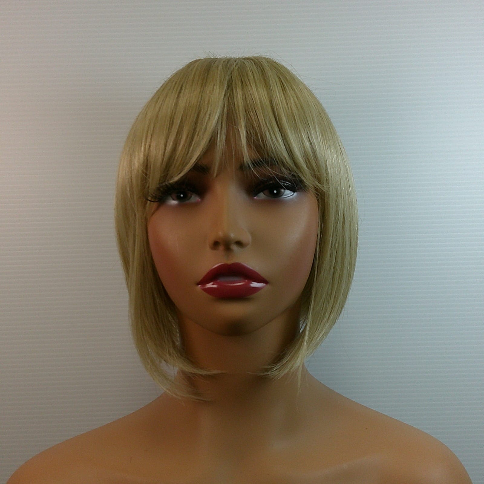 Carly - Blonde Short Length Synthetic HF Wig | Carolyn Anderson Salon